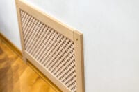 Modern Radiator Covers and Cabinet Ideas That Hide Your Old-School Pipes
